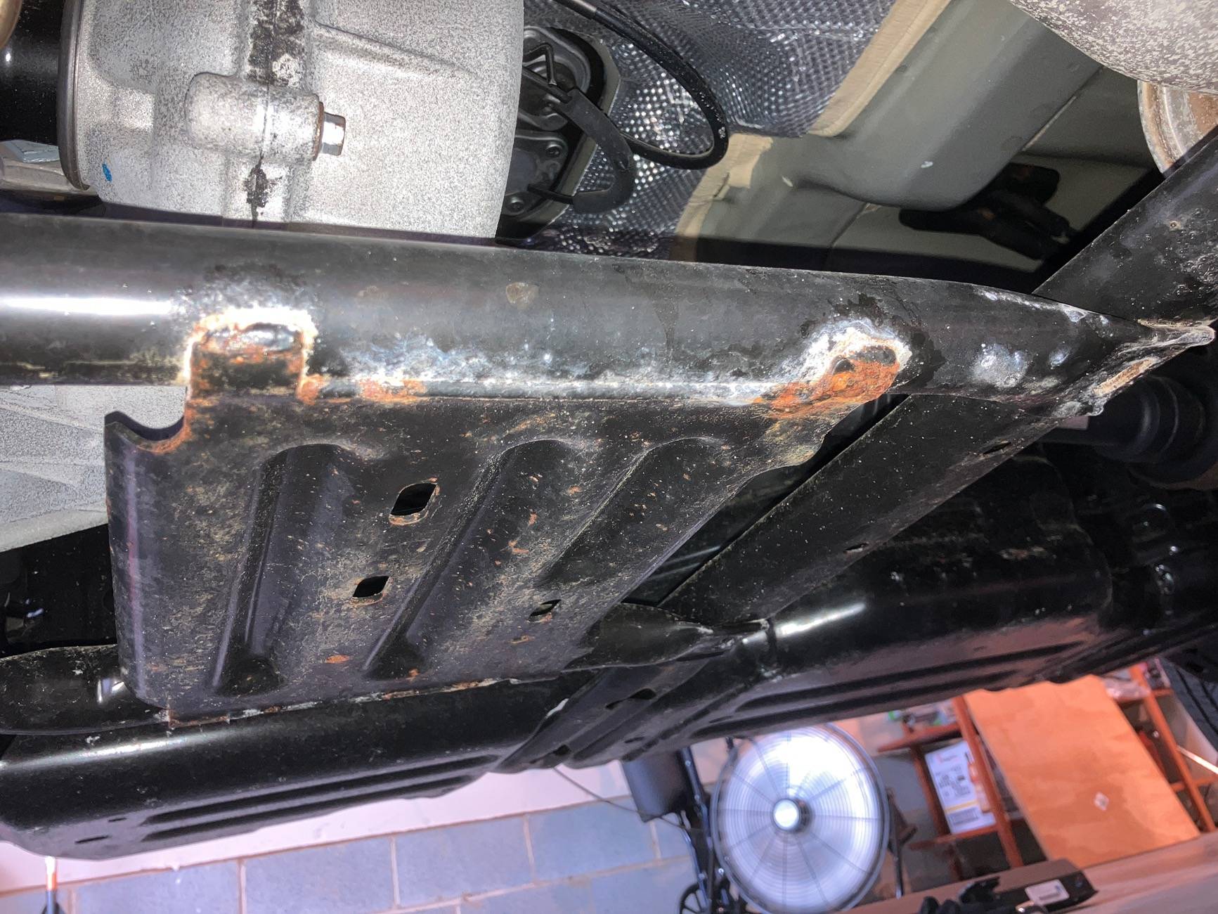 Rust under 2024 Gladiator with 90 miles it, on dealer lot. Pics below ...